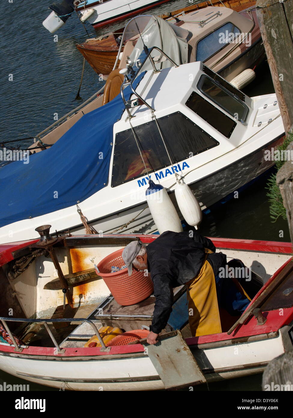 Moored boats at the harbour side Stock Photo - Alamy