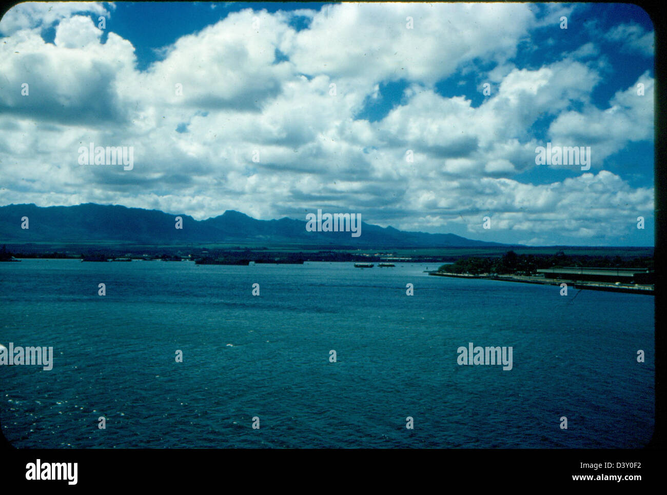 This historical photograph captures the USS Kearsarge (CV-33), with VF ...