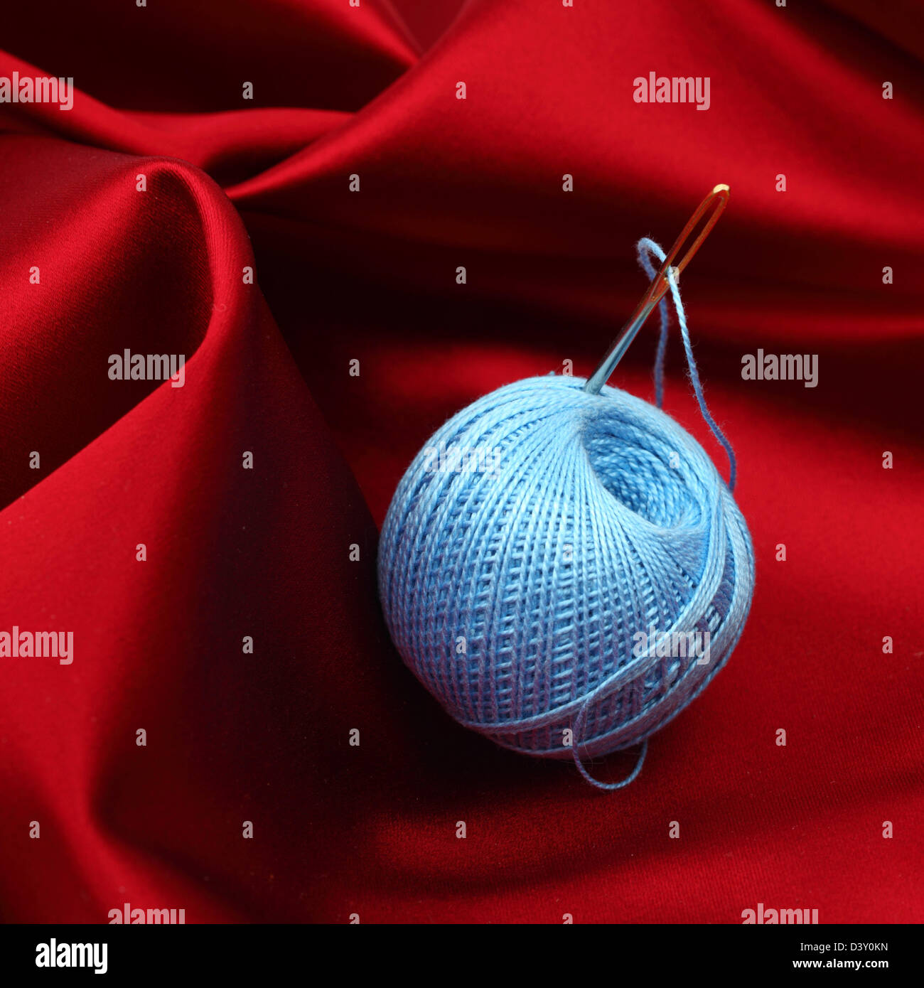 Thread and needle close-up Stock Photo - Alamy