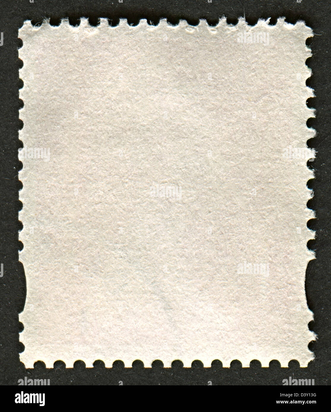 The reverse side of a postage stamp Stock Photo - Alamy