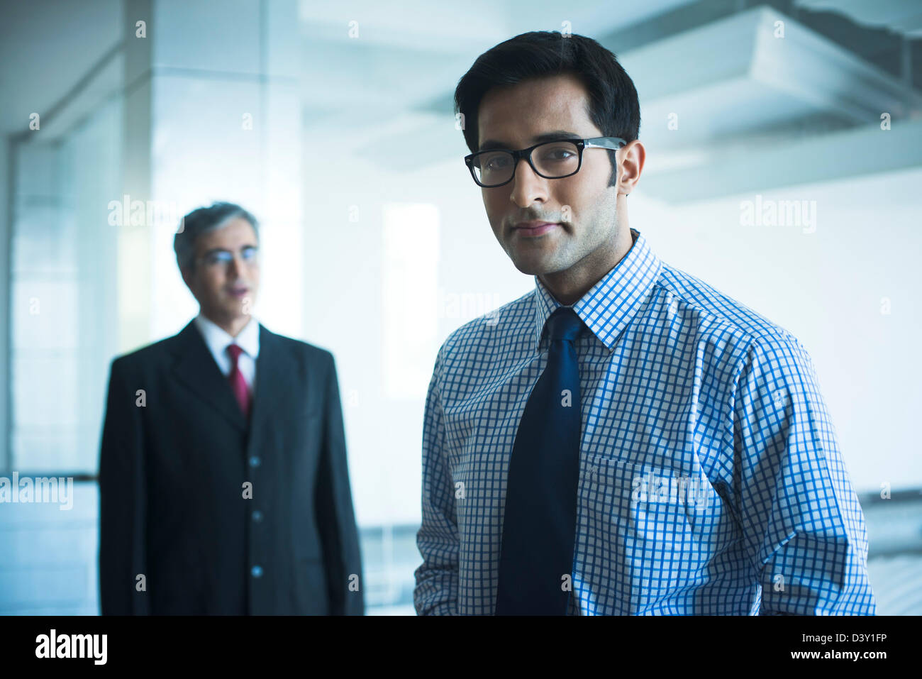 Two businessmen in an office Stock Photo - Alamy
