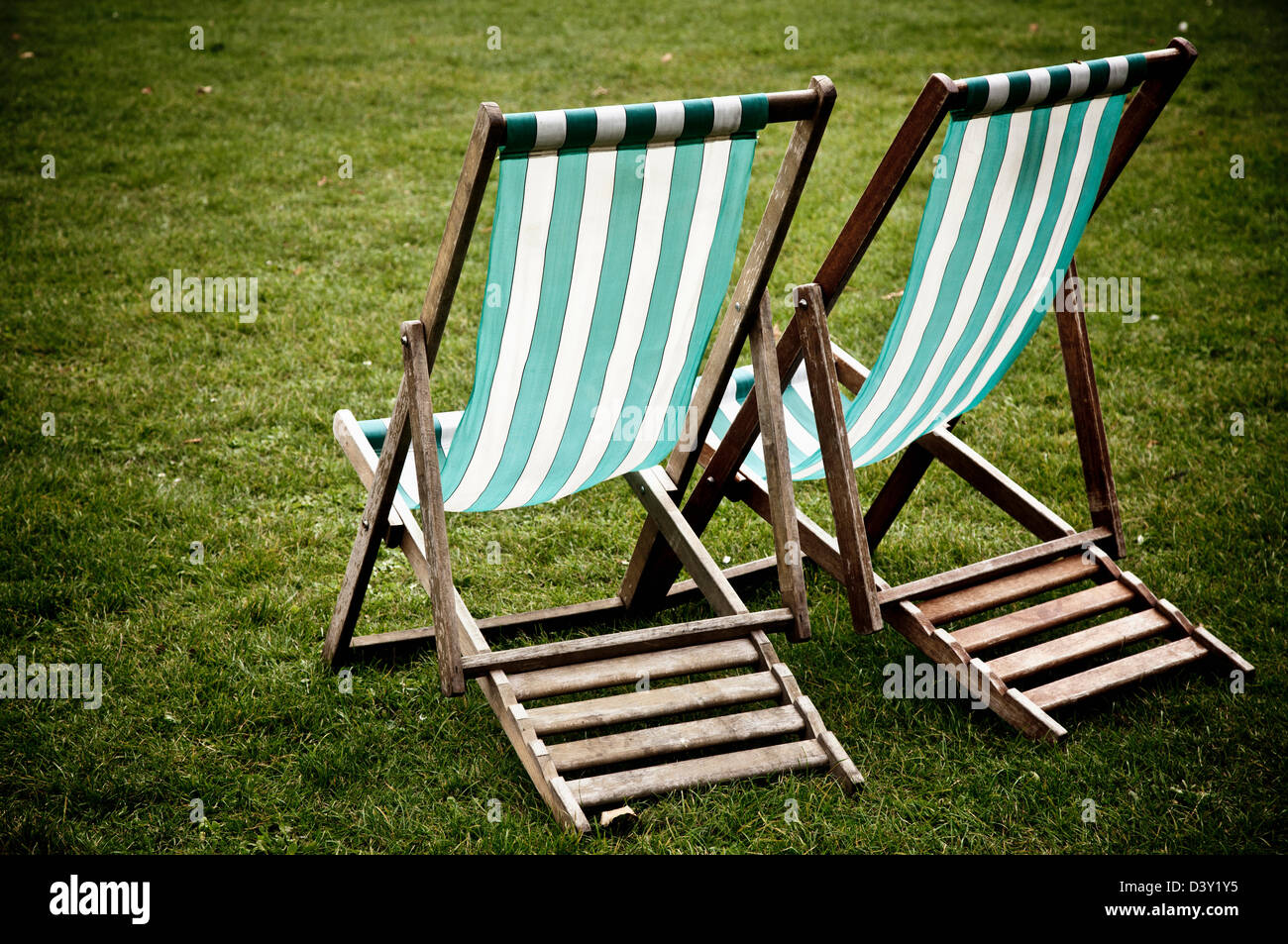 Two law chairs on grass Stock Photo - Alamy