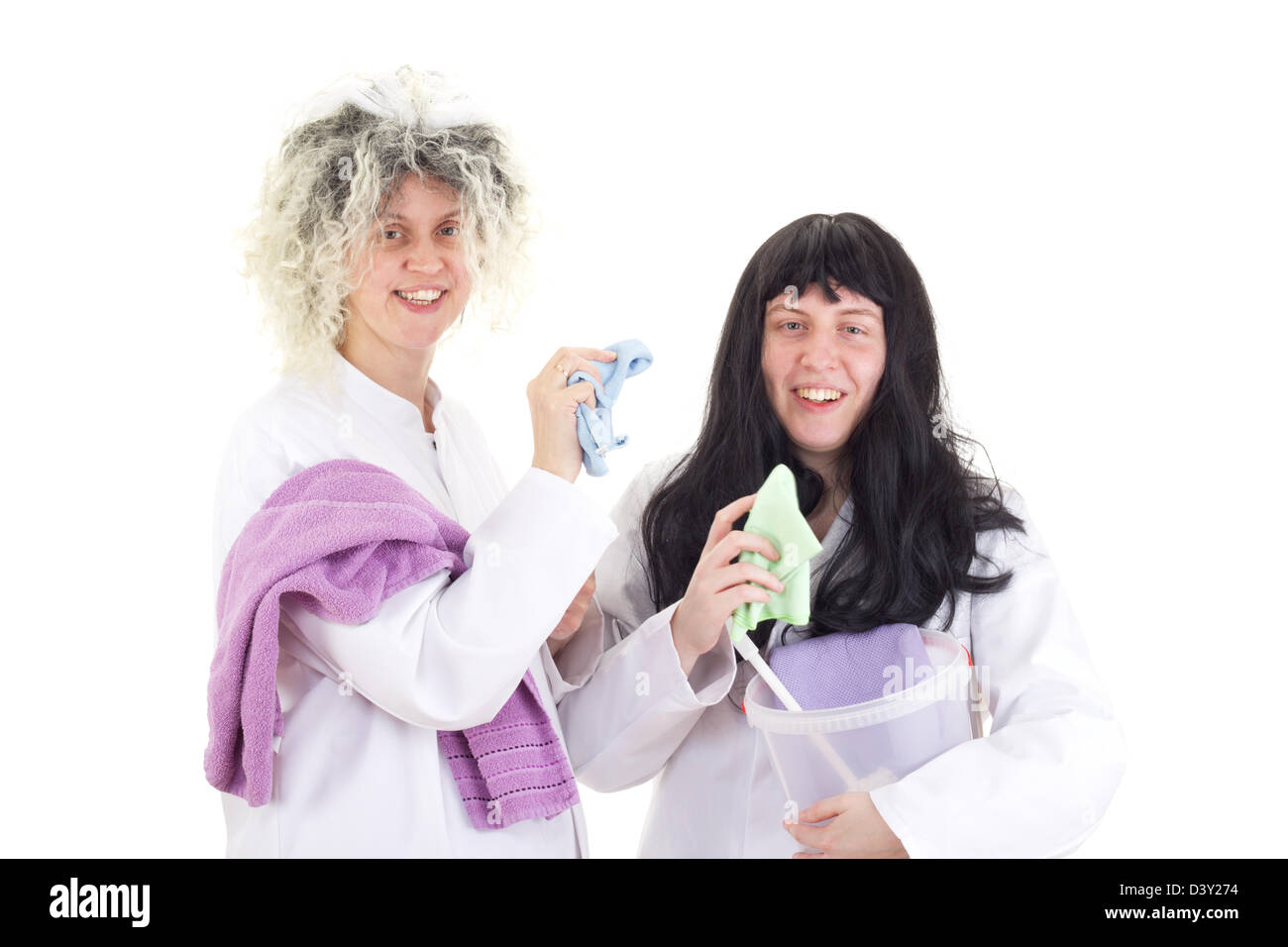 Female cleaners in white work coats Stock Photo - Alamy