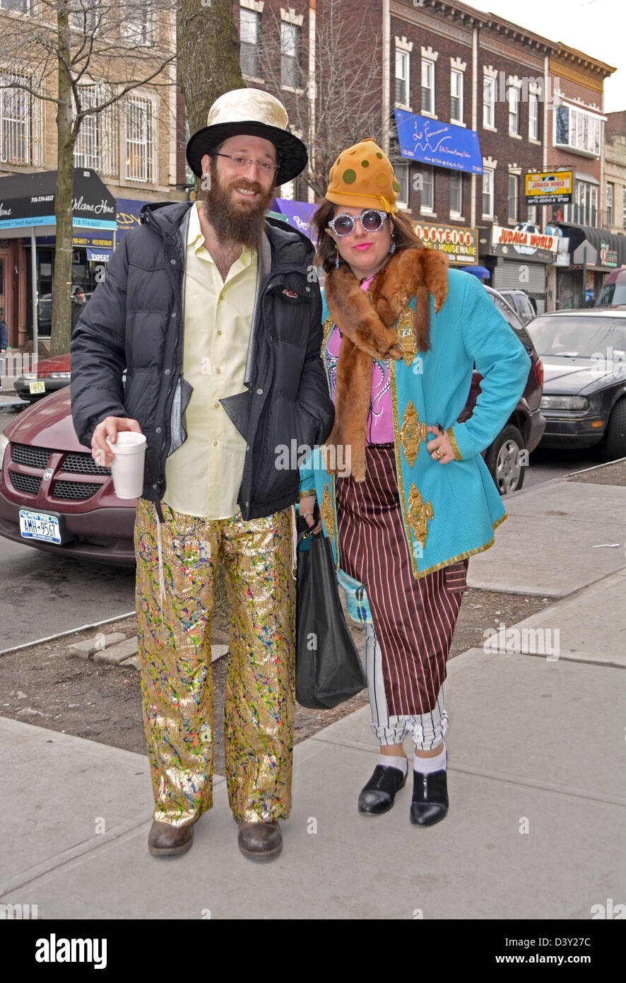 Hasidic Jewish couple in costume for the Purim holiday in the Crown ...