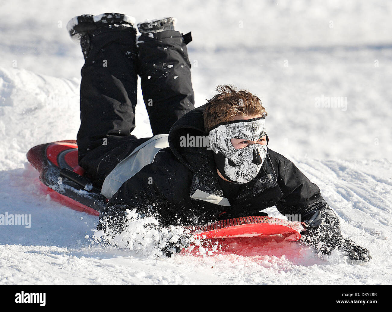 Kids sledding in CT USA. Winter fun in New England Stock Photo - Alamy