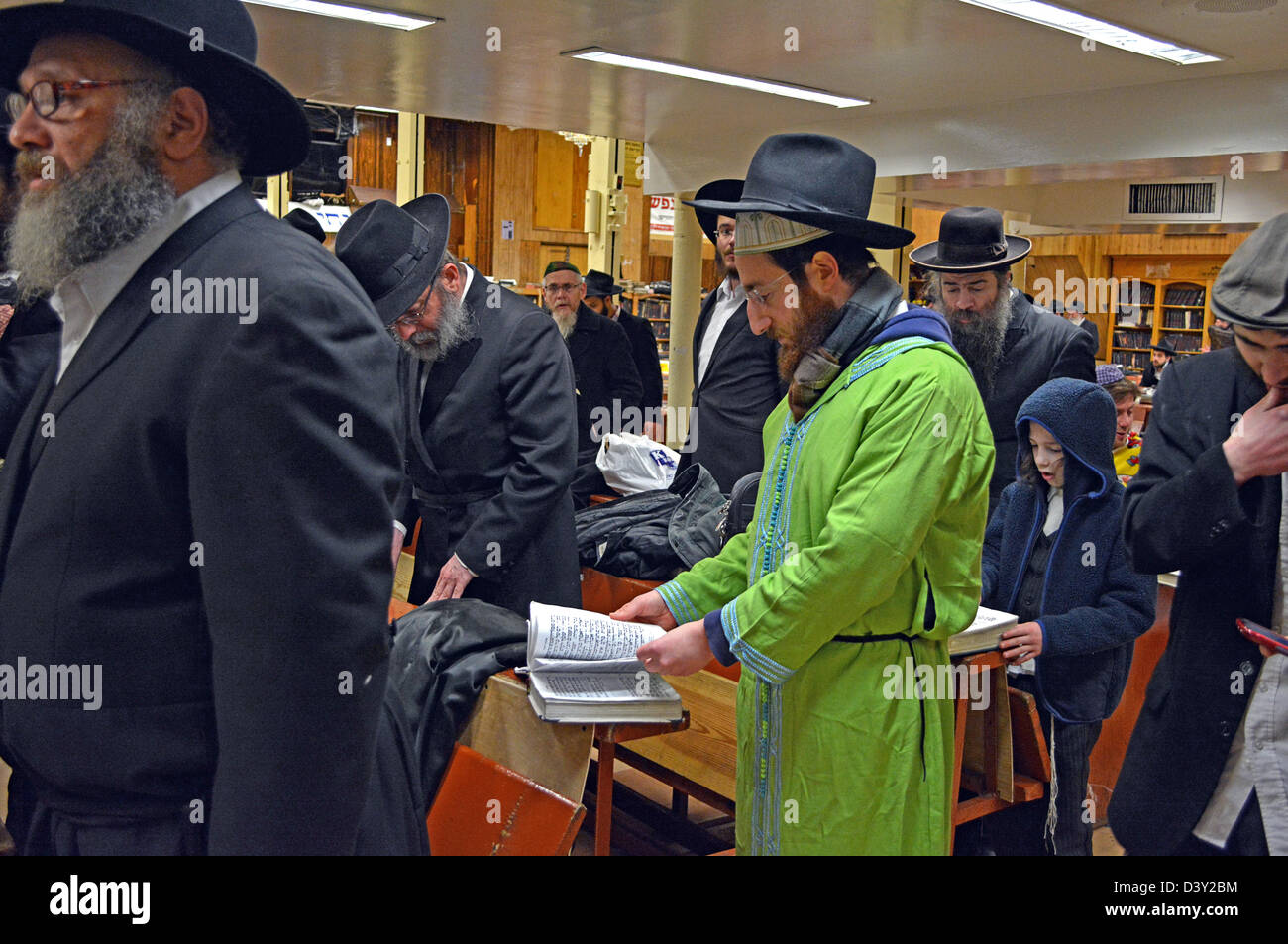 Hasidic Jewish man praying in costume during the Purim holiday in the ...