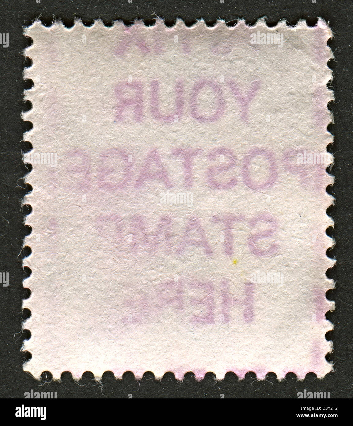 The reverse side of a postage stamp Stock Photo - Alamy