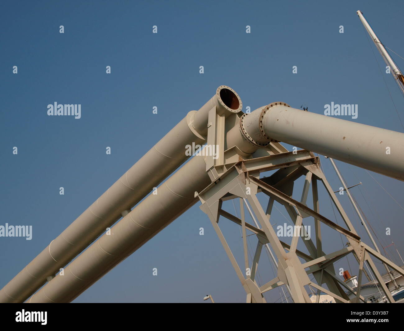 A large overhead pipe for draining and dredging Stock Photo - Alamy