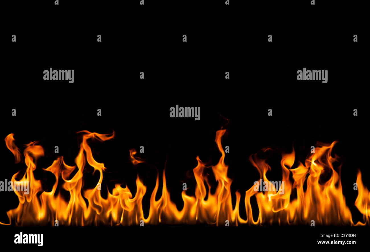 Flames against a black background hi-res stock photography and images ...