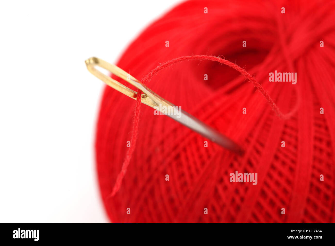 Thread and needle close-up Stock Photo - Alamy