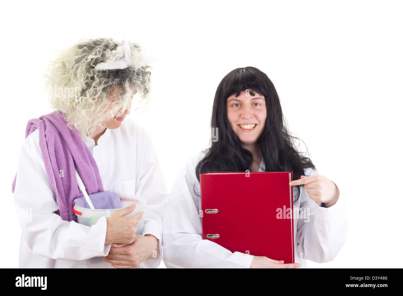 Female cleaners in white work coats Stock Photo - Alamy