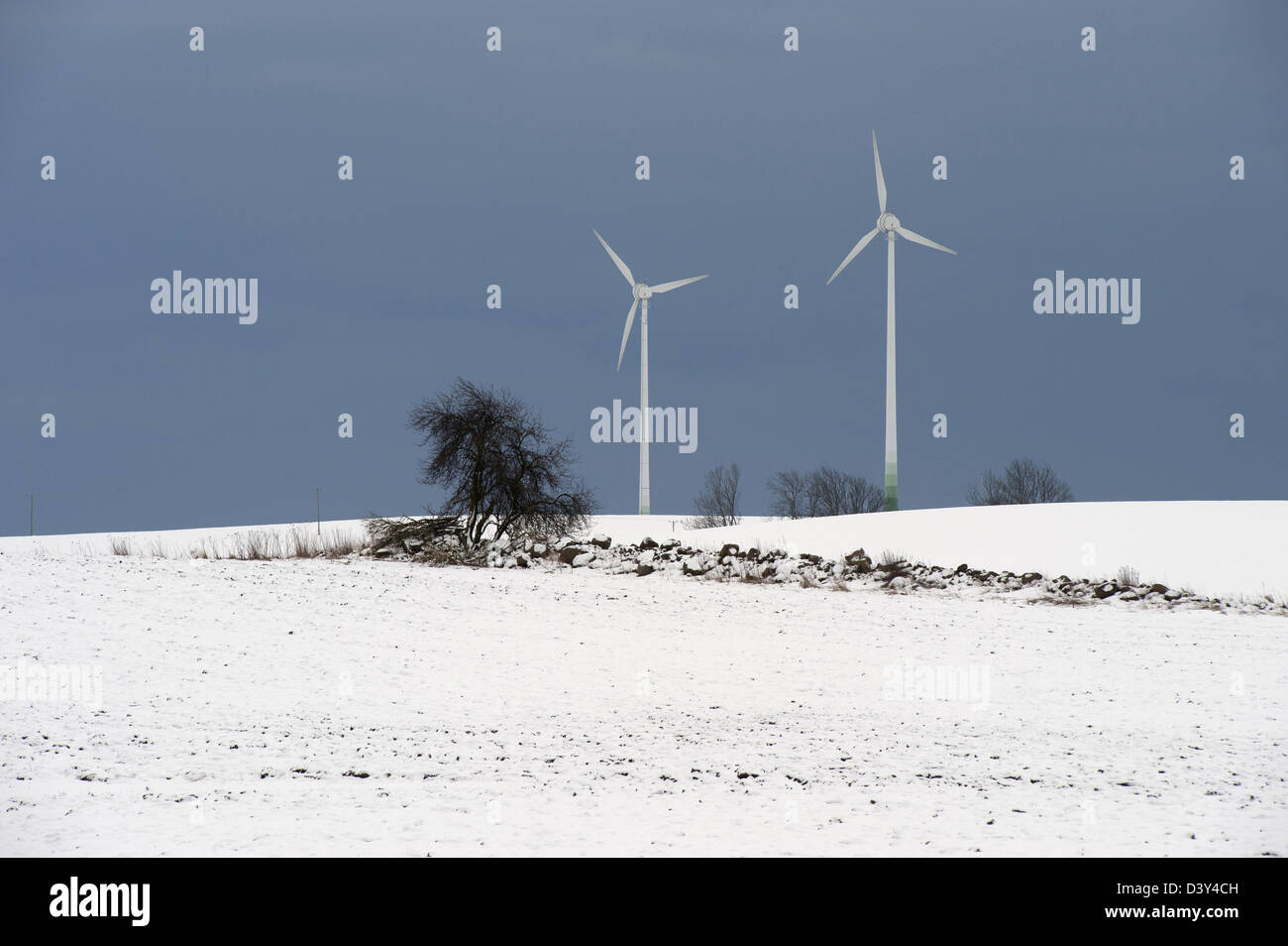 Wind power stations on windy winter fields in an open landscape Stock ...
