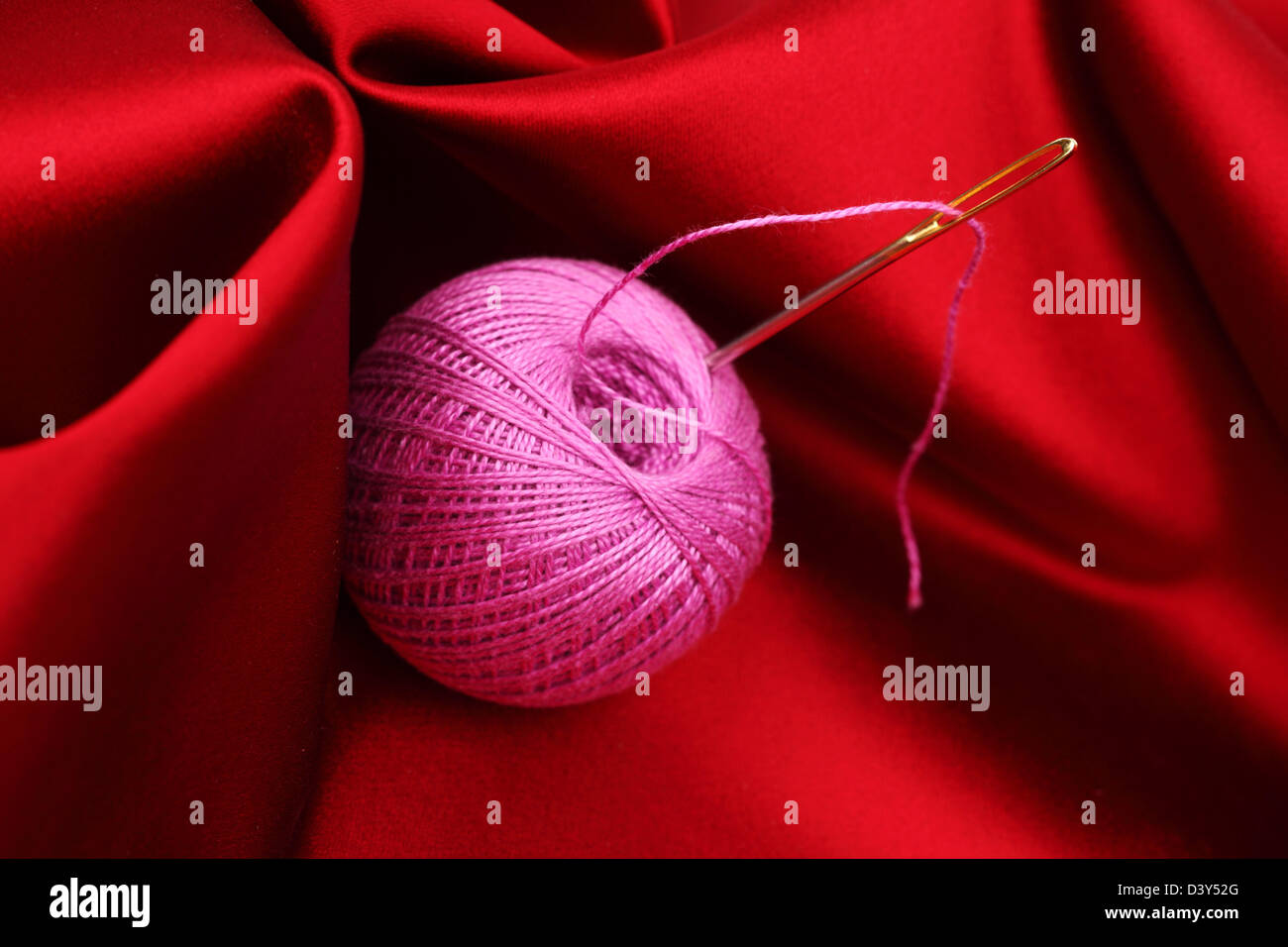Thread on fabric Stock Photo - Alamy