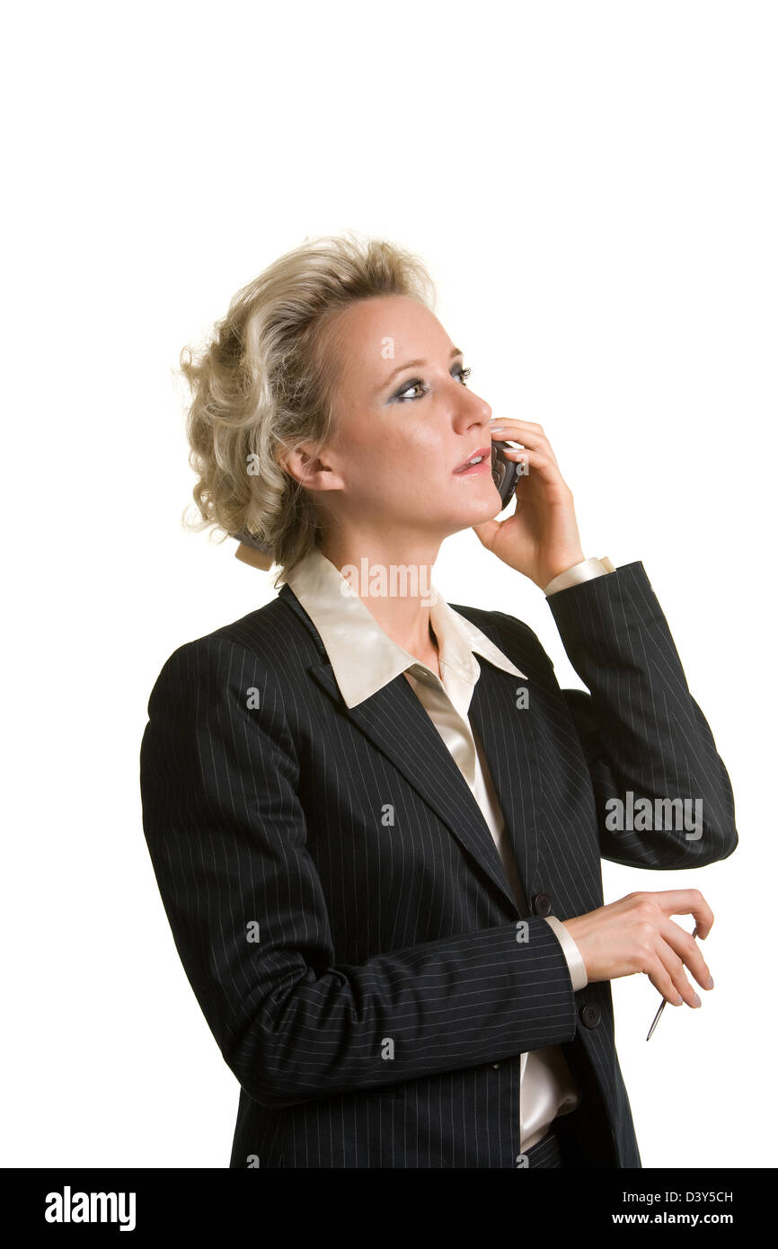 Russian woman in business suit talking on PDA style phone Stock Photo ...