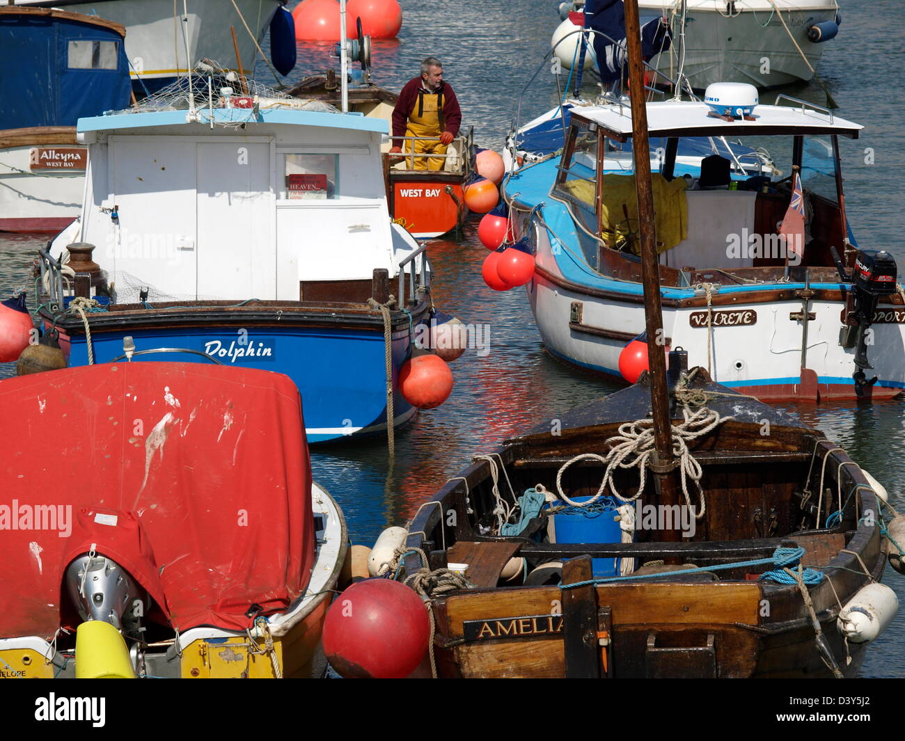 Colourful boats in harbour Stock Photo - Alamy