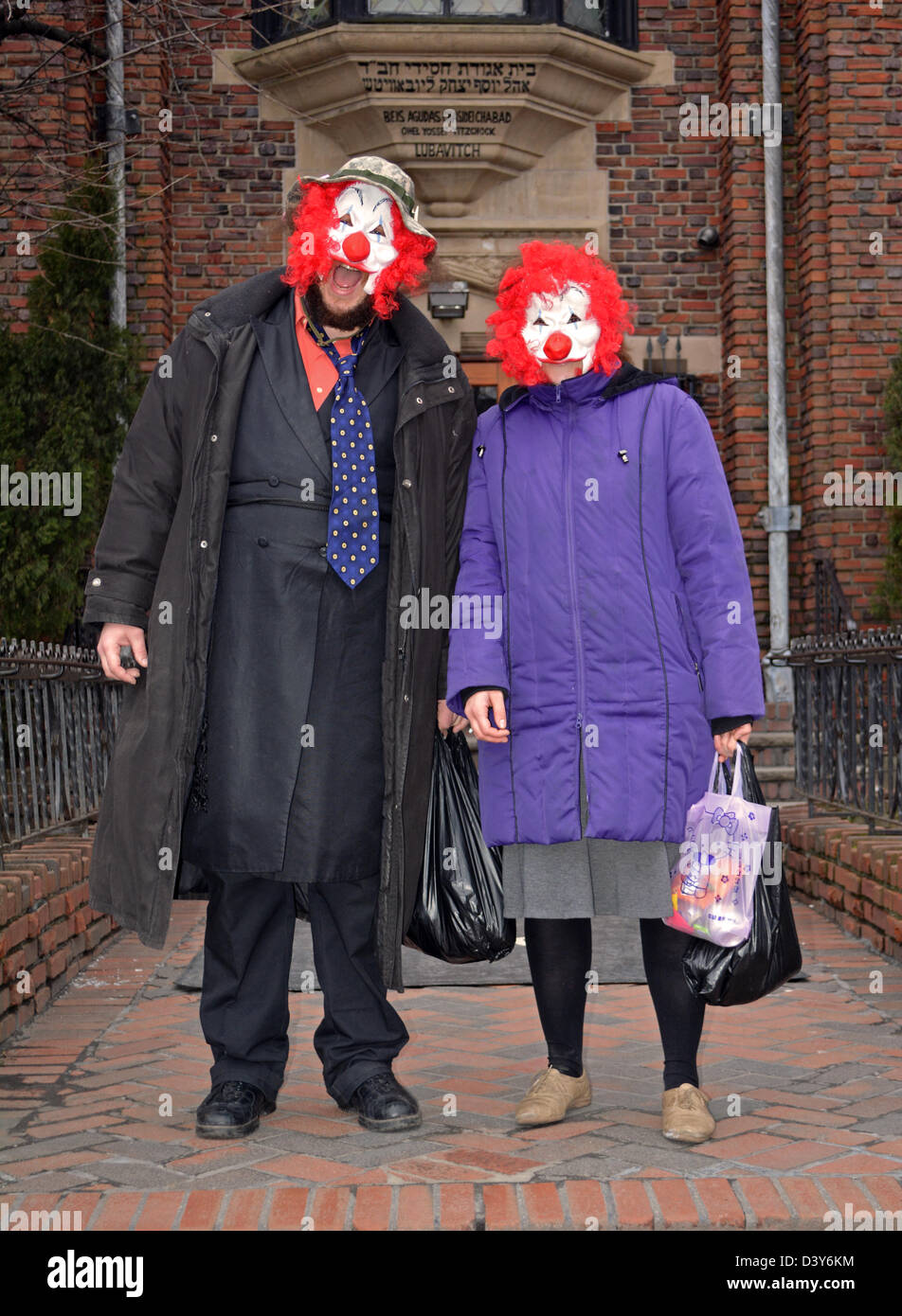 Hasidic Jewish couple in costume for the Purim holiday in the Crown ...