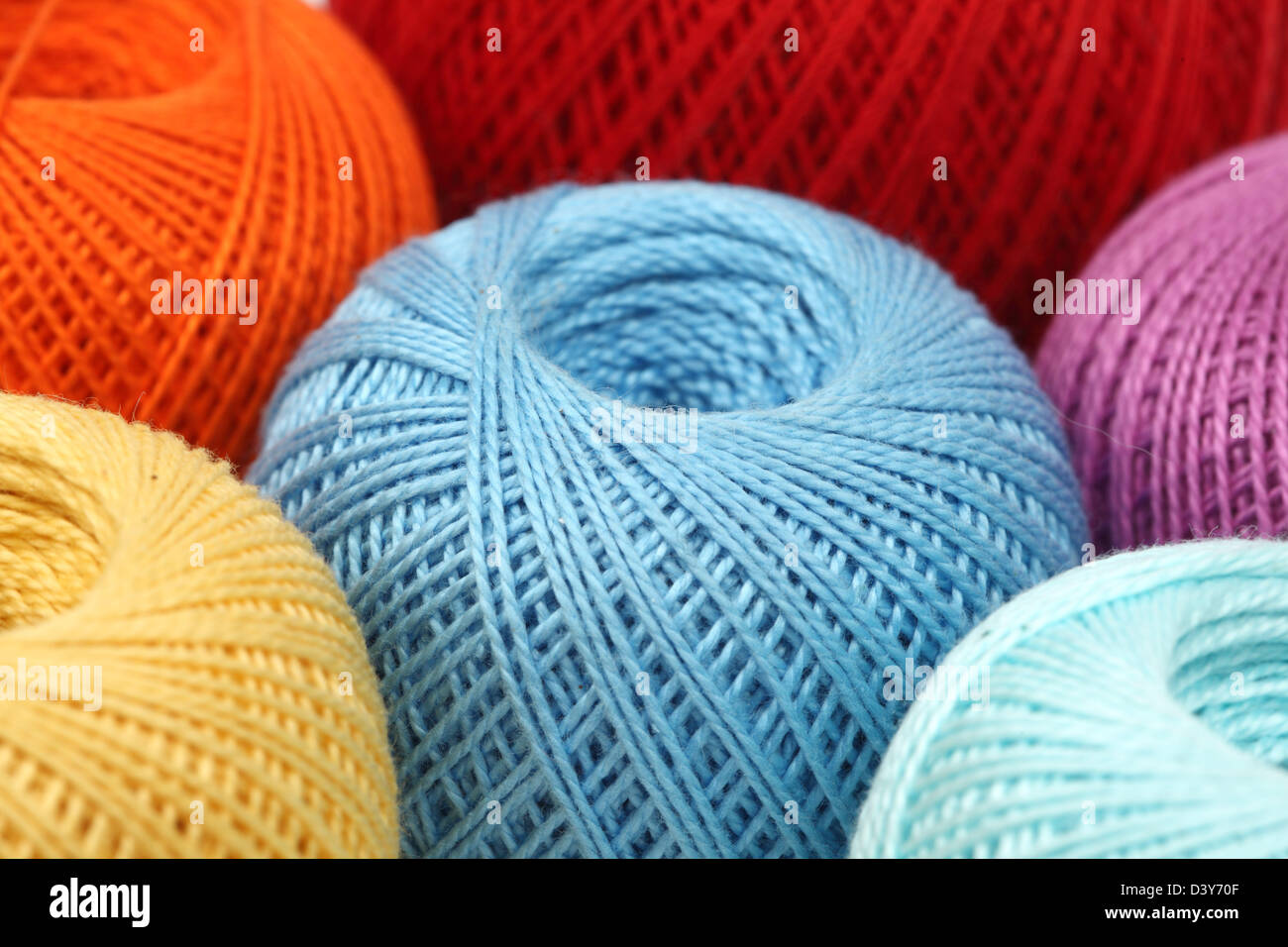 Thread and needle close-up Stock Photo - Alamy