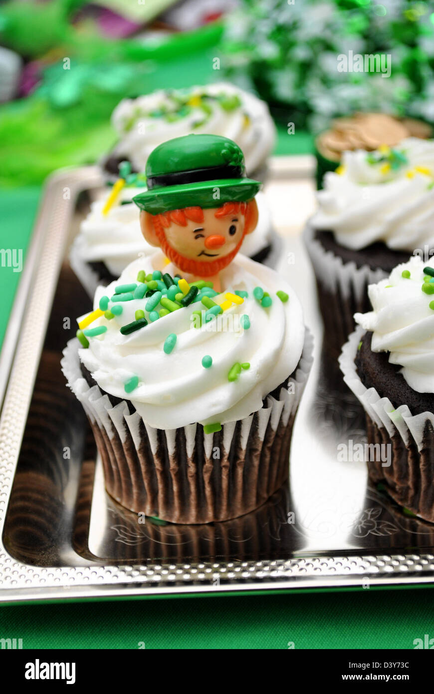 Winking Figure on a Chocolate Cupcake Stock Photo - Alamy