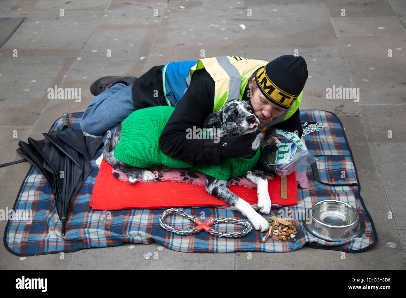 Homeless man with dog hi-res stock photography and images - Alamy