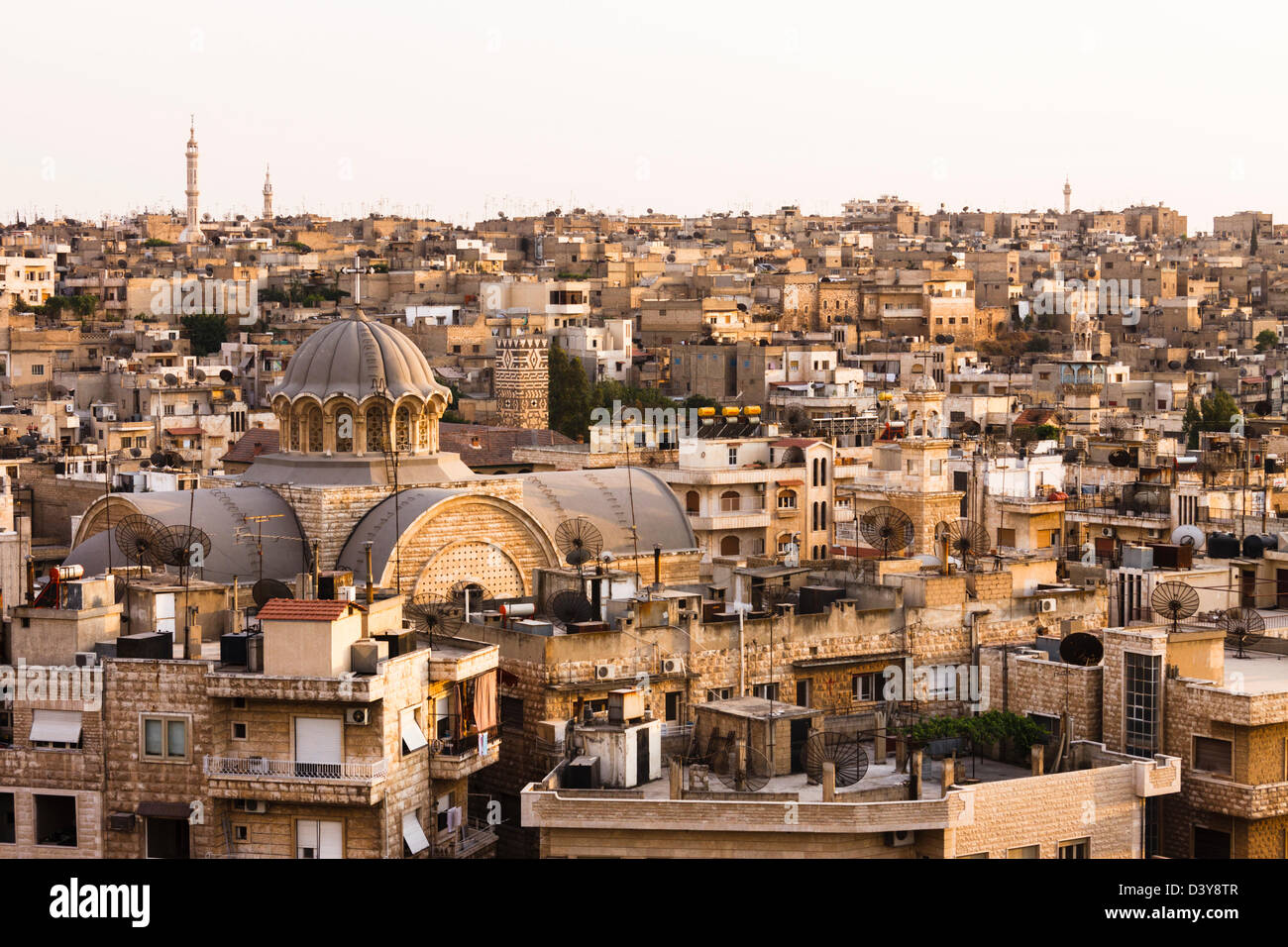 Syriac church and view of Hama skyline with minarets from the citadel ...