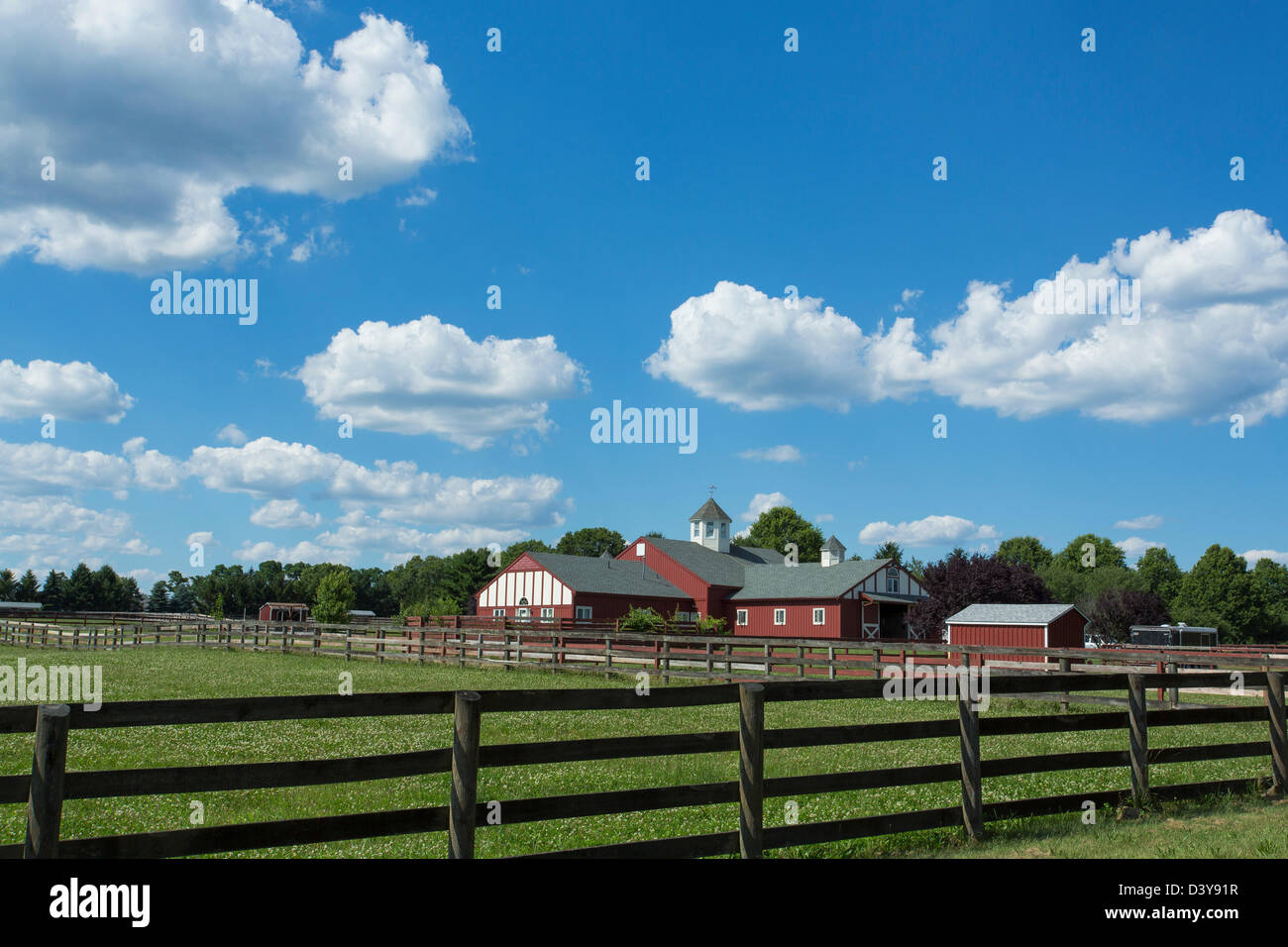 Farm house with a big grass field Stock Photo - Alamy