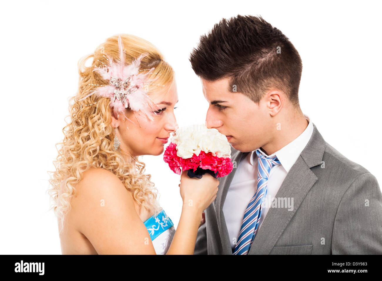Loving wedding couple holding flower, isolated on white background ...
