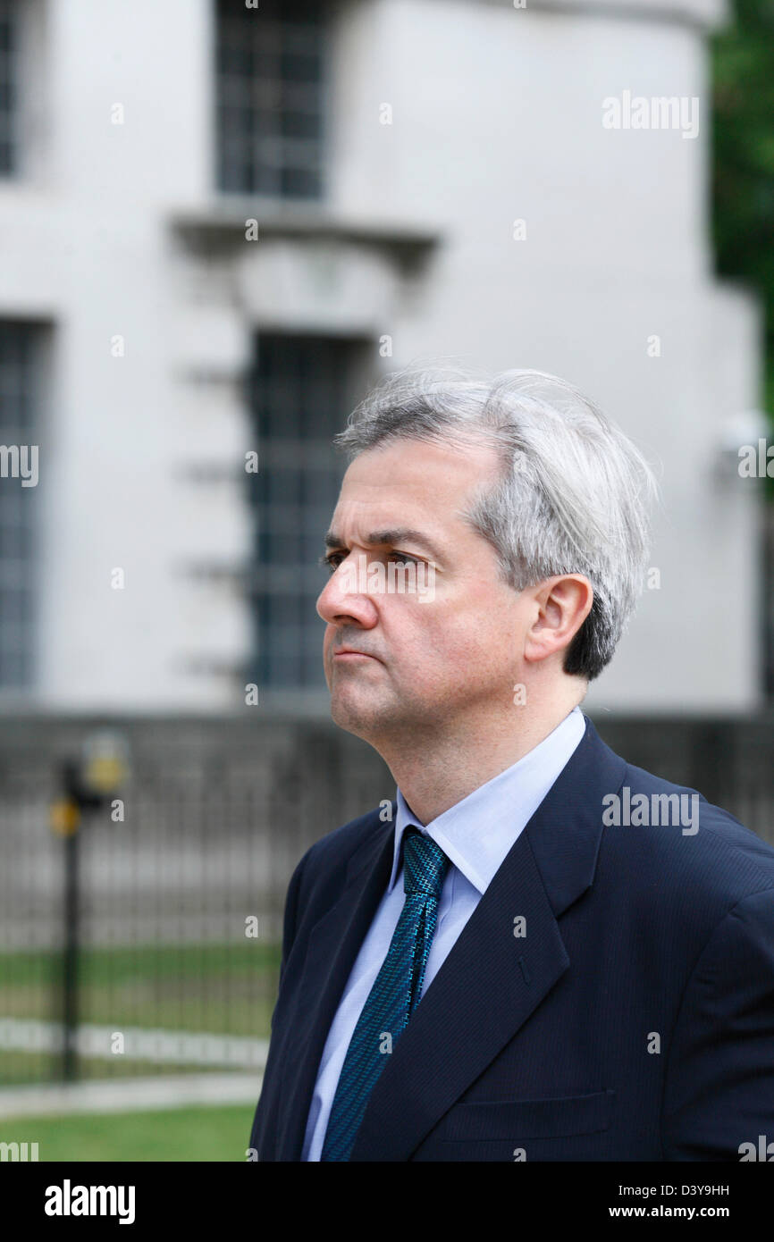 Liberal Democrat MP Chris Huhne is pictured walking down Whitehall in ...