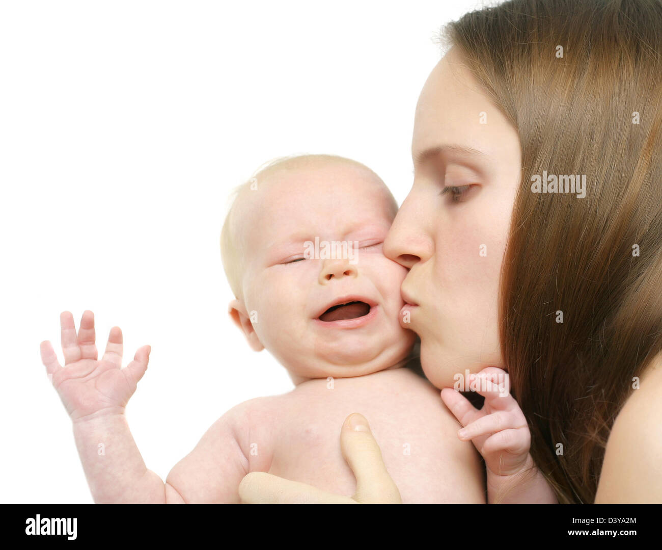 Mother kiss her crying baby Stock Photo - Alamy