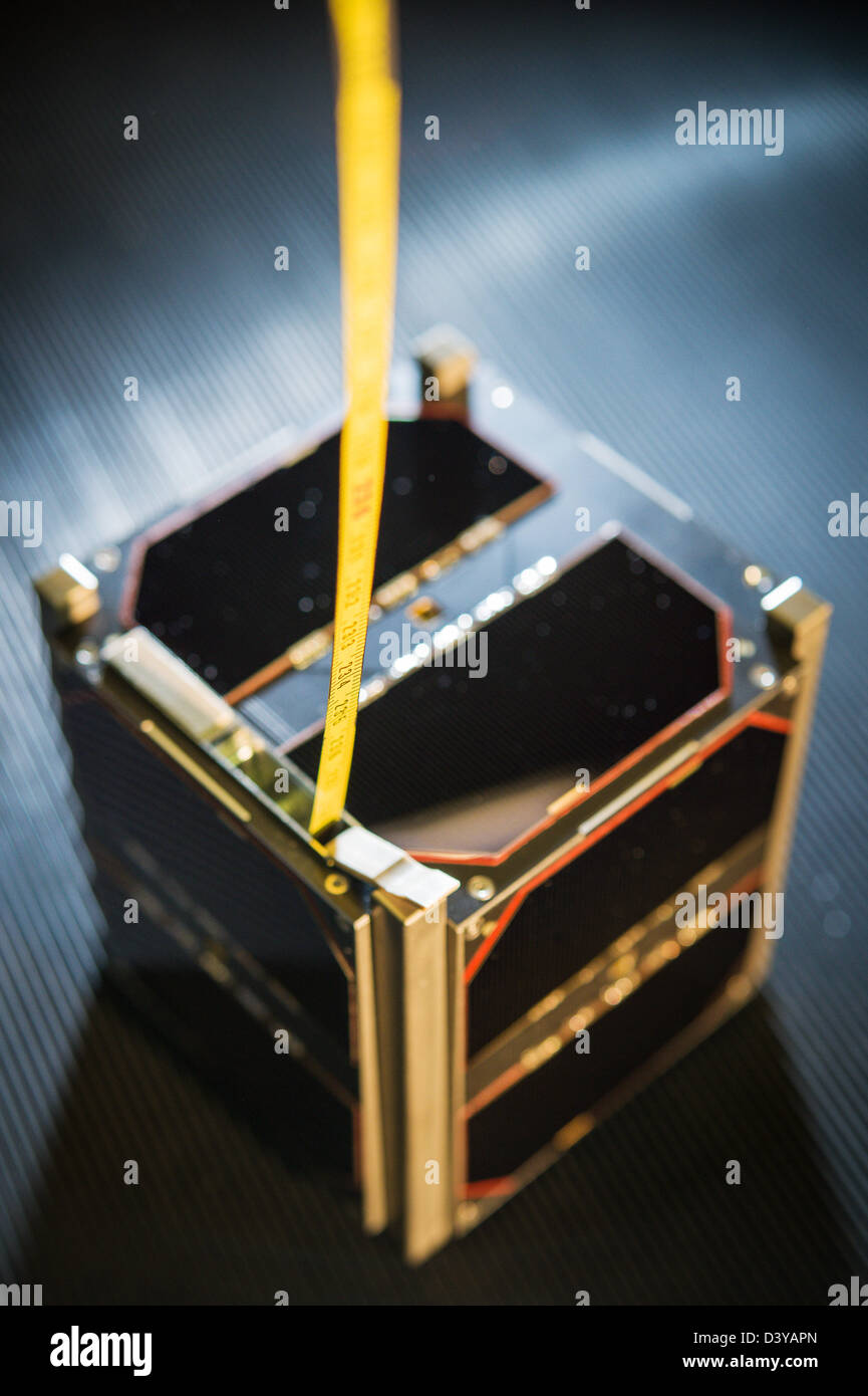 A measuring tape converted into an antenna sticks out of an engineering ...