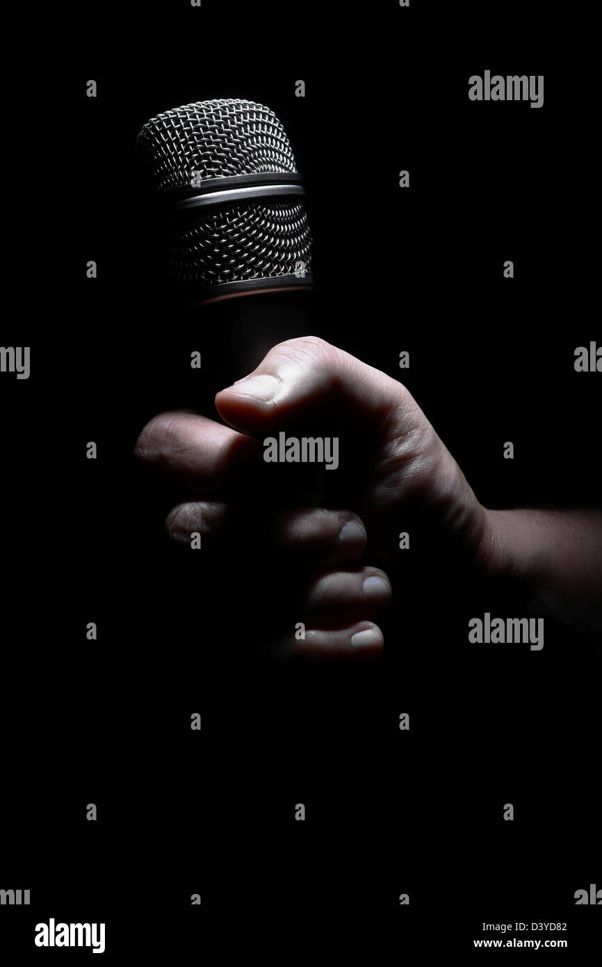 Hand microphone sing hi-res stock photography and images - Alamy