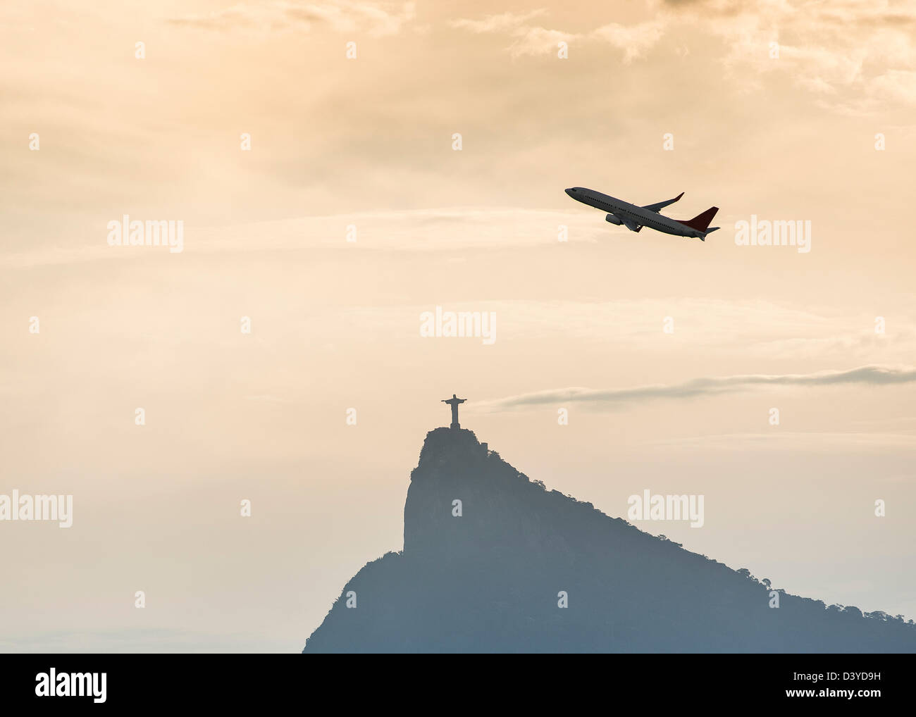 Airplane over Christ de Redeemer in Rio de Janeiro Stock Photo - Alamy