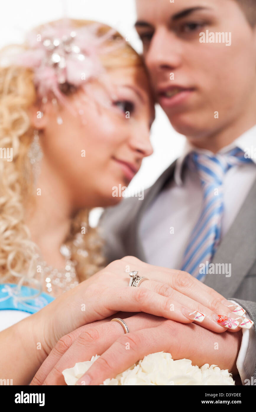 Wedding detail of bride and groom. Shallow depth of field with focus on ...