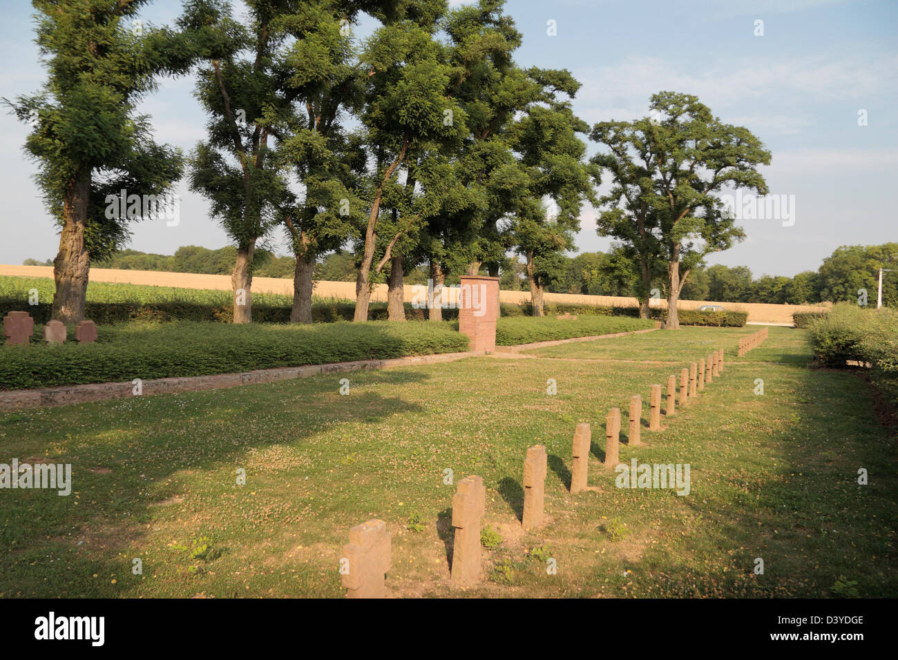 Line of crosses with a mass grave behind in the German Cemetery ...