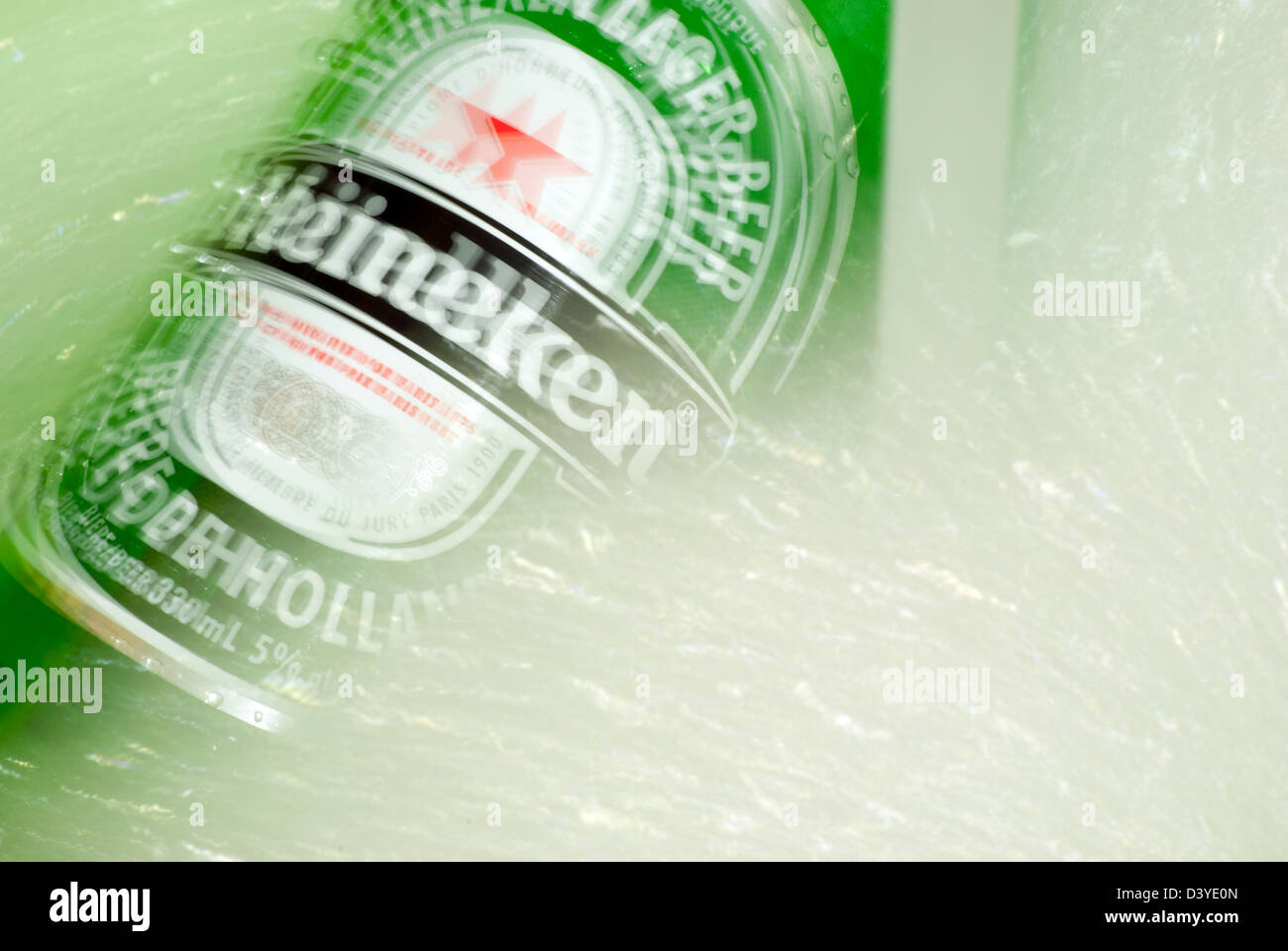 Green Heineken bottle shaking dizziness effect Stock Photo - Alamy