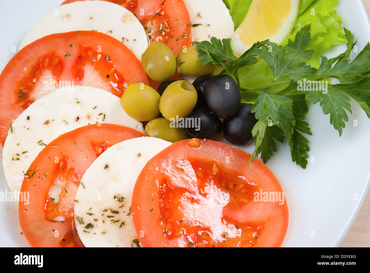 Arrangement of mozzarella and tomatoes.Italian kitchen Stock Photo - Alamy