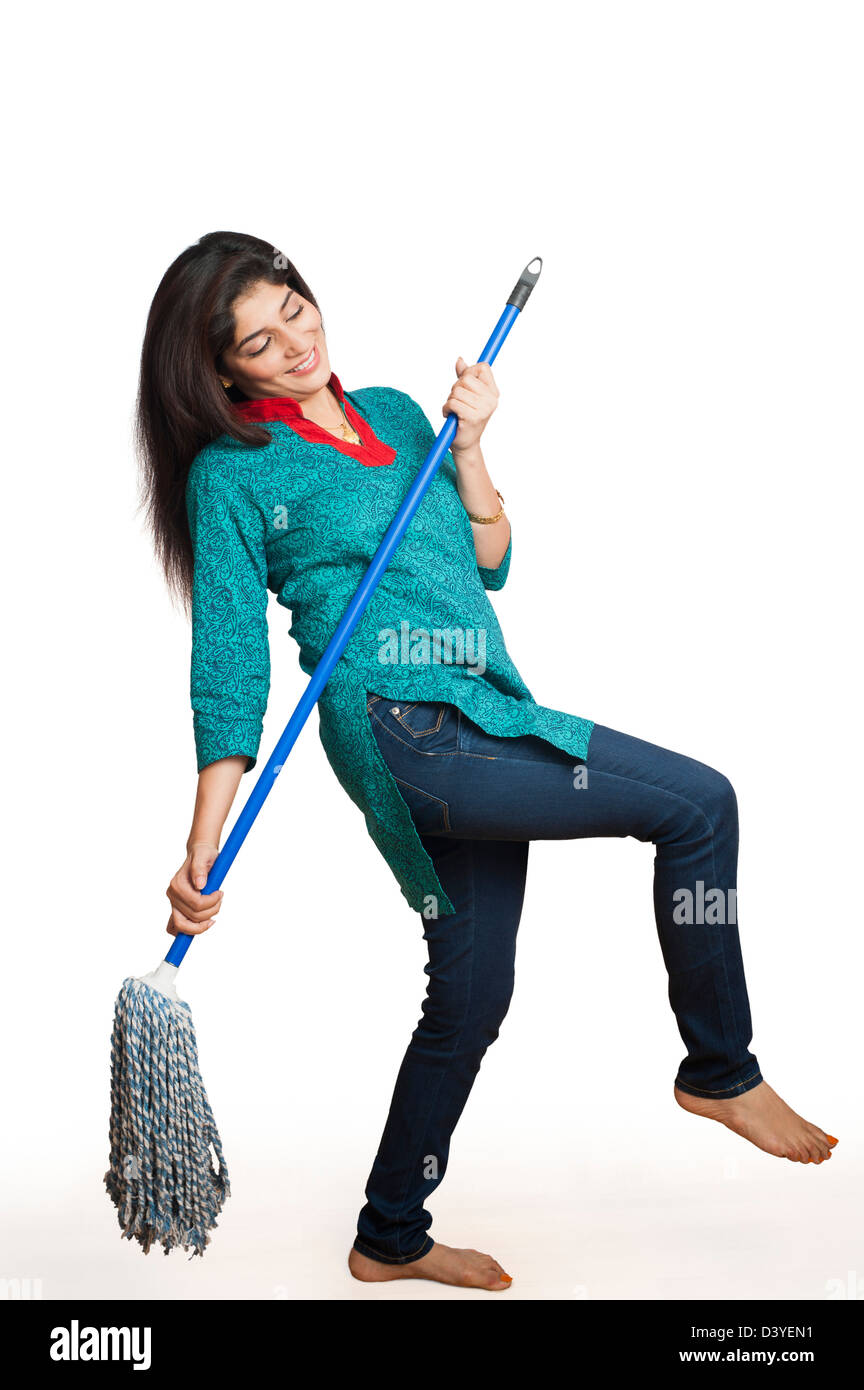 Woman cleaning floor with a mop Stock Photo - Alamy