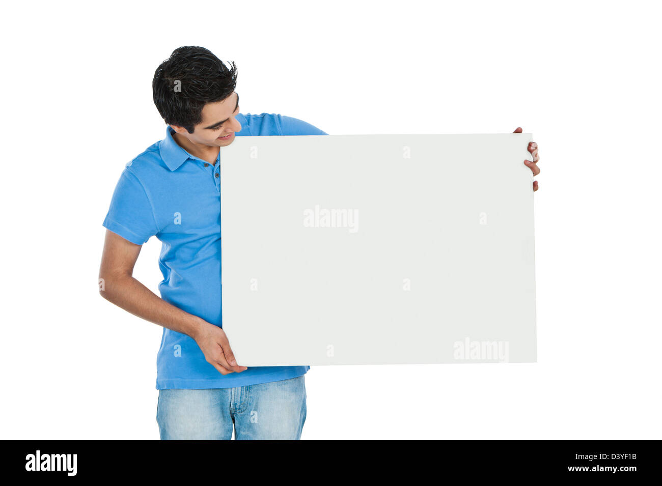 Man looking at a whiteboard and smiling Stock Photo - Alamy
