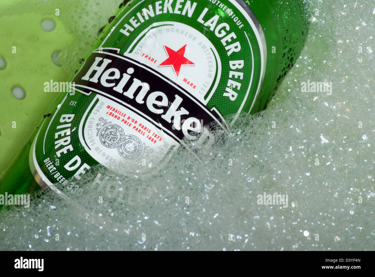 Green Heineken bottle Stock Photo - Alamy