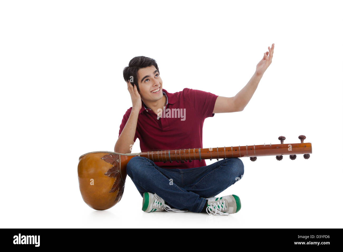 Indian man playing sitar on hi-res stock photography and images - Alamy