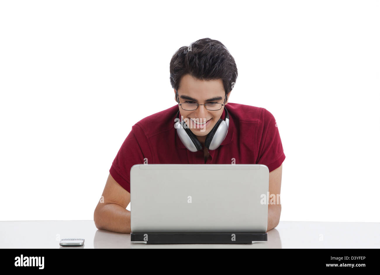 Happy man using a laptop Stock Photo - Alamy