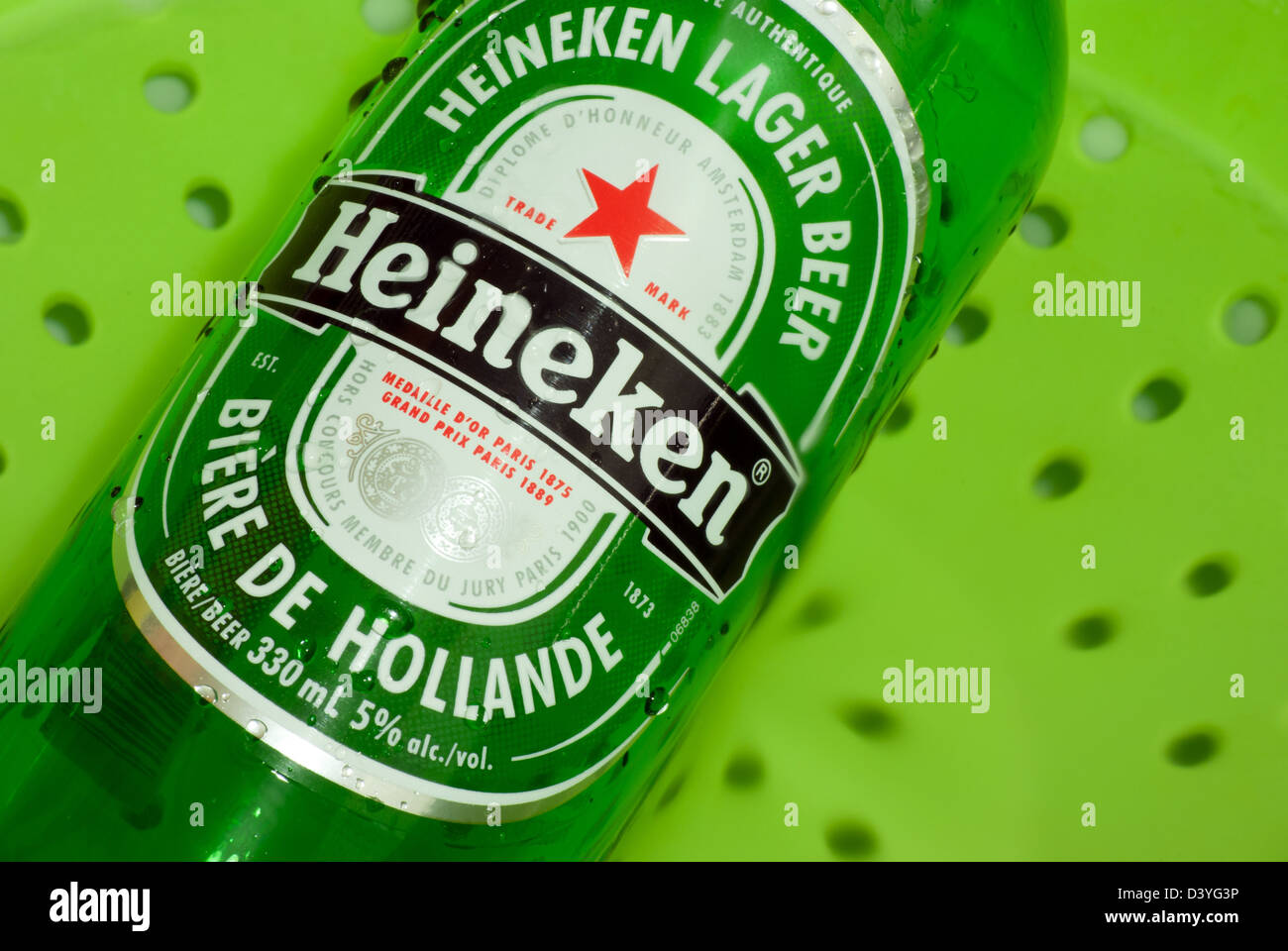 Green Heineken bottle Stock Photo - Alamy