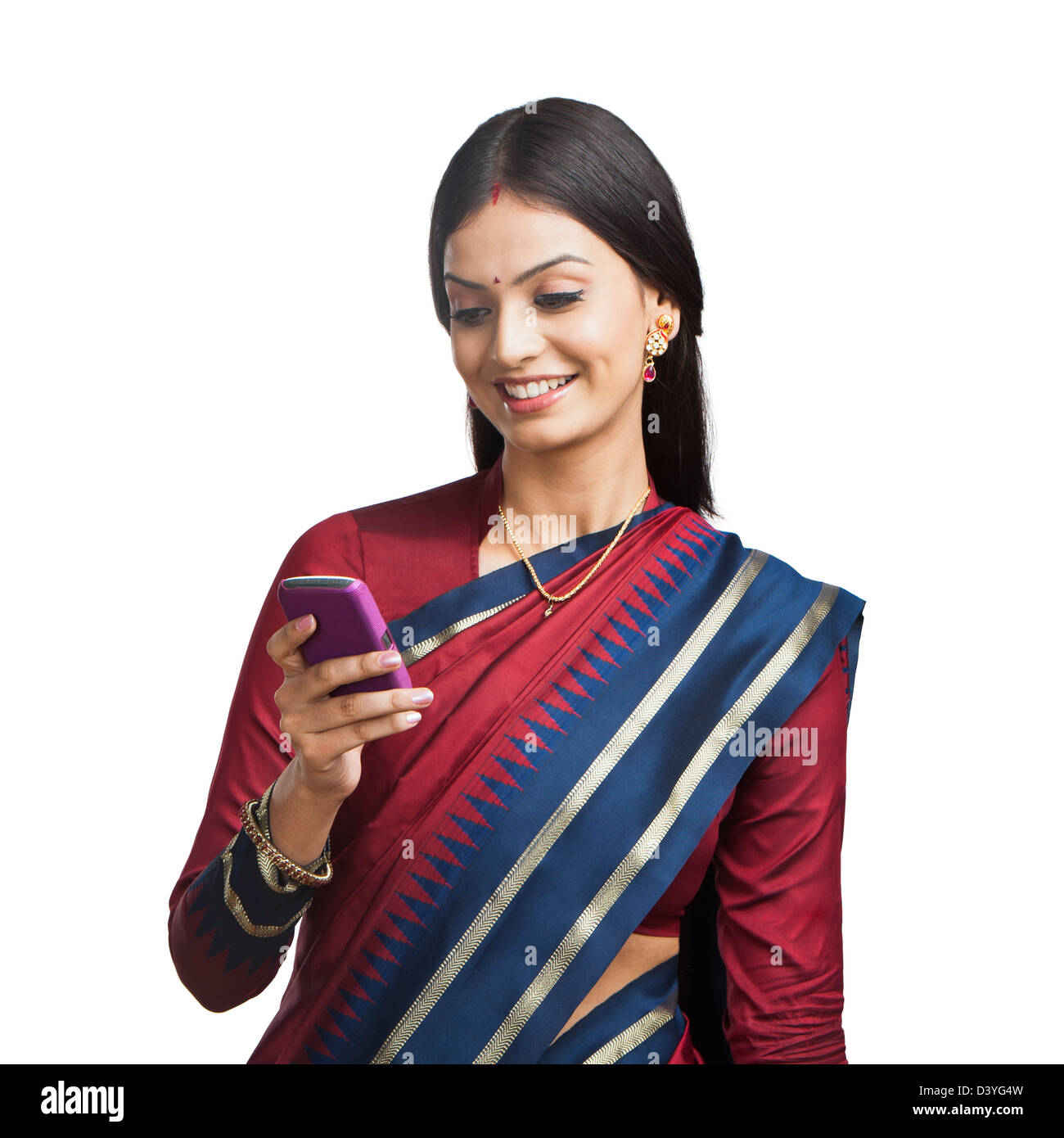 Traditionally Indian woman using a mobile phone Stock Photo - Alamy