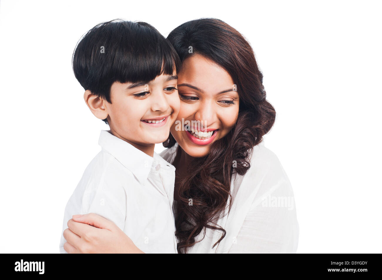 Happy mother and son smiling Stock Photo - Alamy