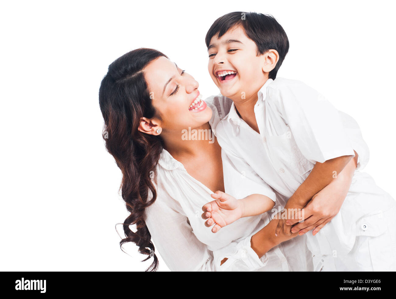 Happy mother and son smiling Stock Photo - Alamy