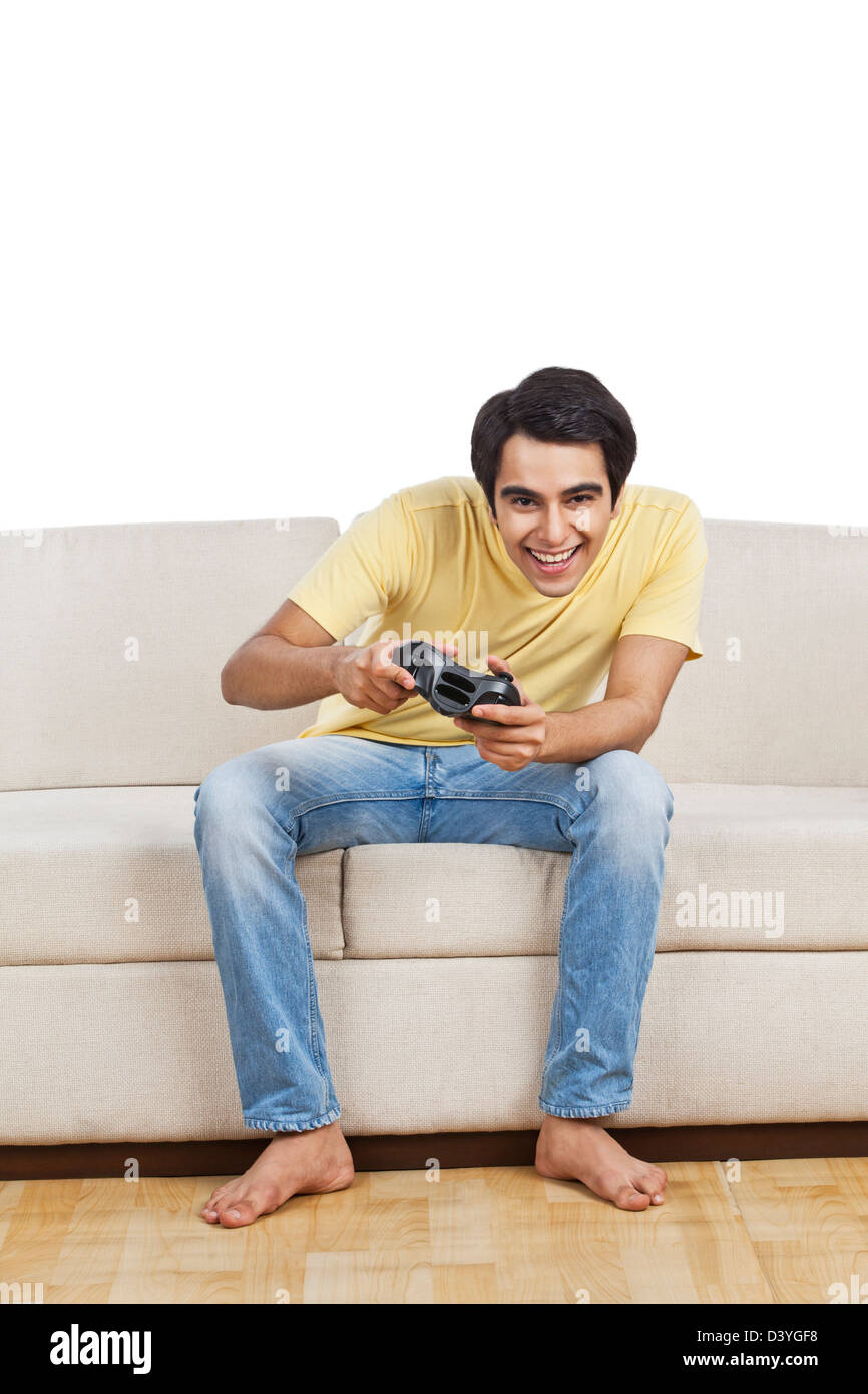 Man playing a video game Stock Photo - Alamy