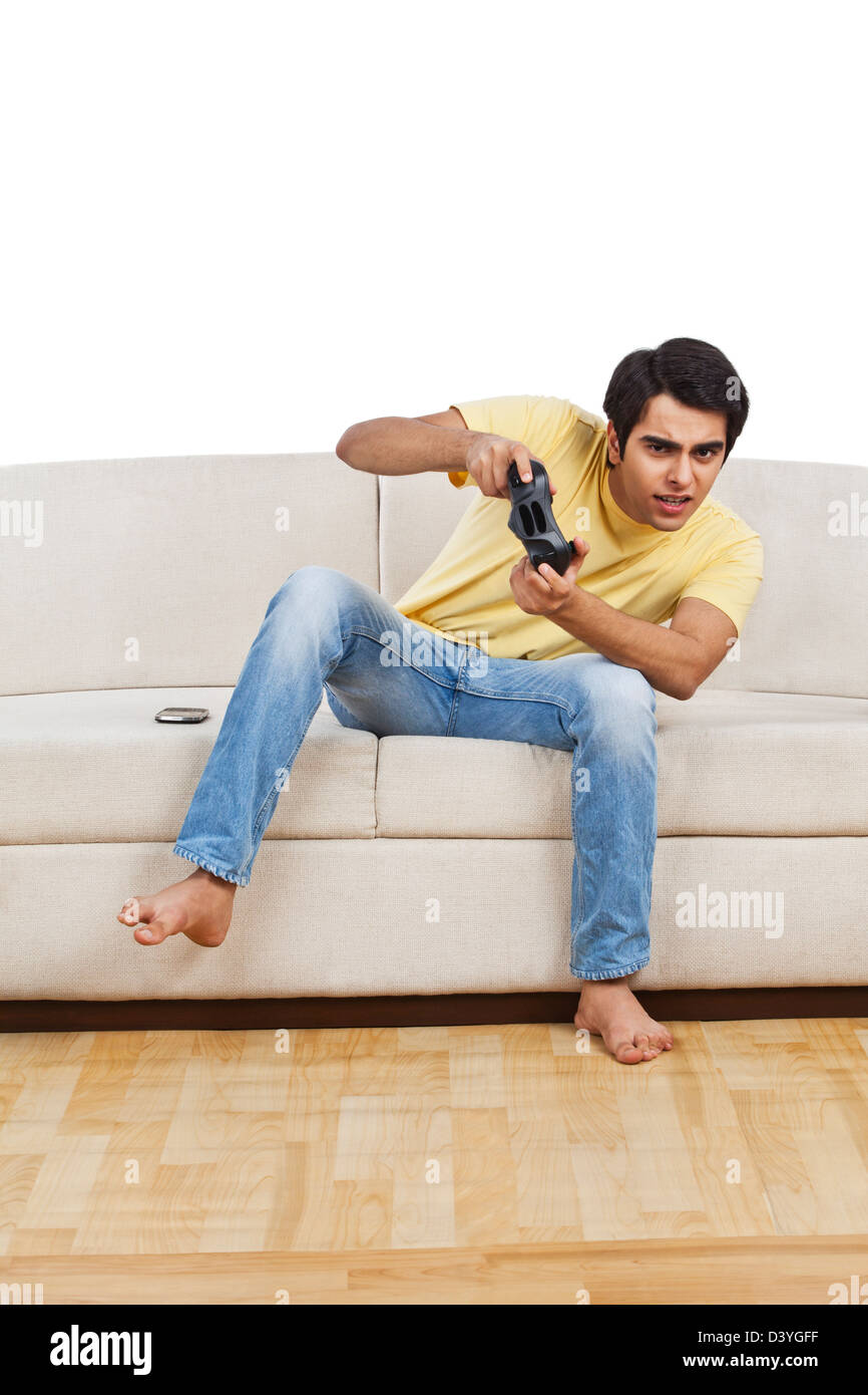 Man playing a video game Stock Photo - Alamy