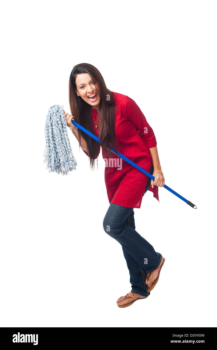 Indian woman sweeping Cut Out Stock Images & Pictures - Alamy