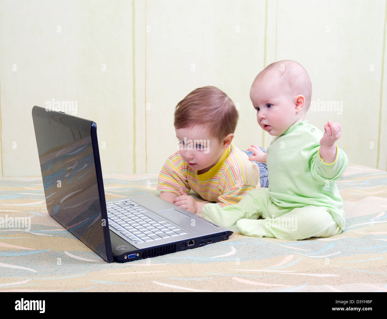 Little girl and boy using laptops.kids playing computer games Stock ...