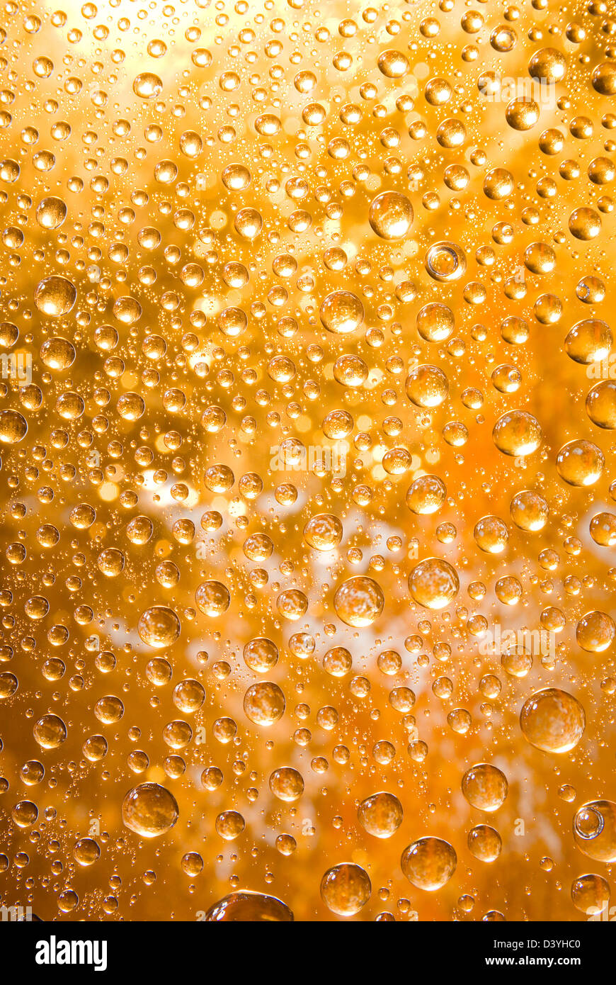 golden water droplets background .close up of water drops Stock Photo ...