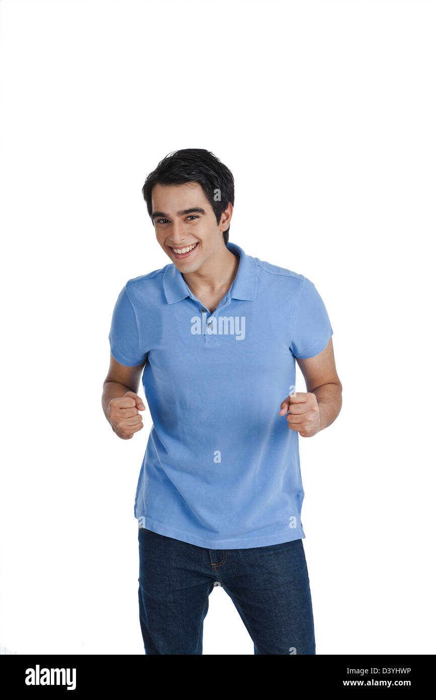 Man celebrating his success and smiling Stock Photo - Alamy